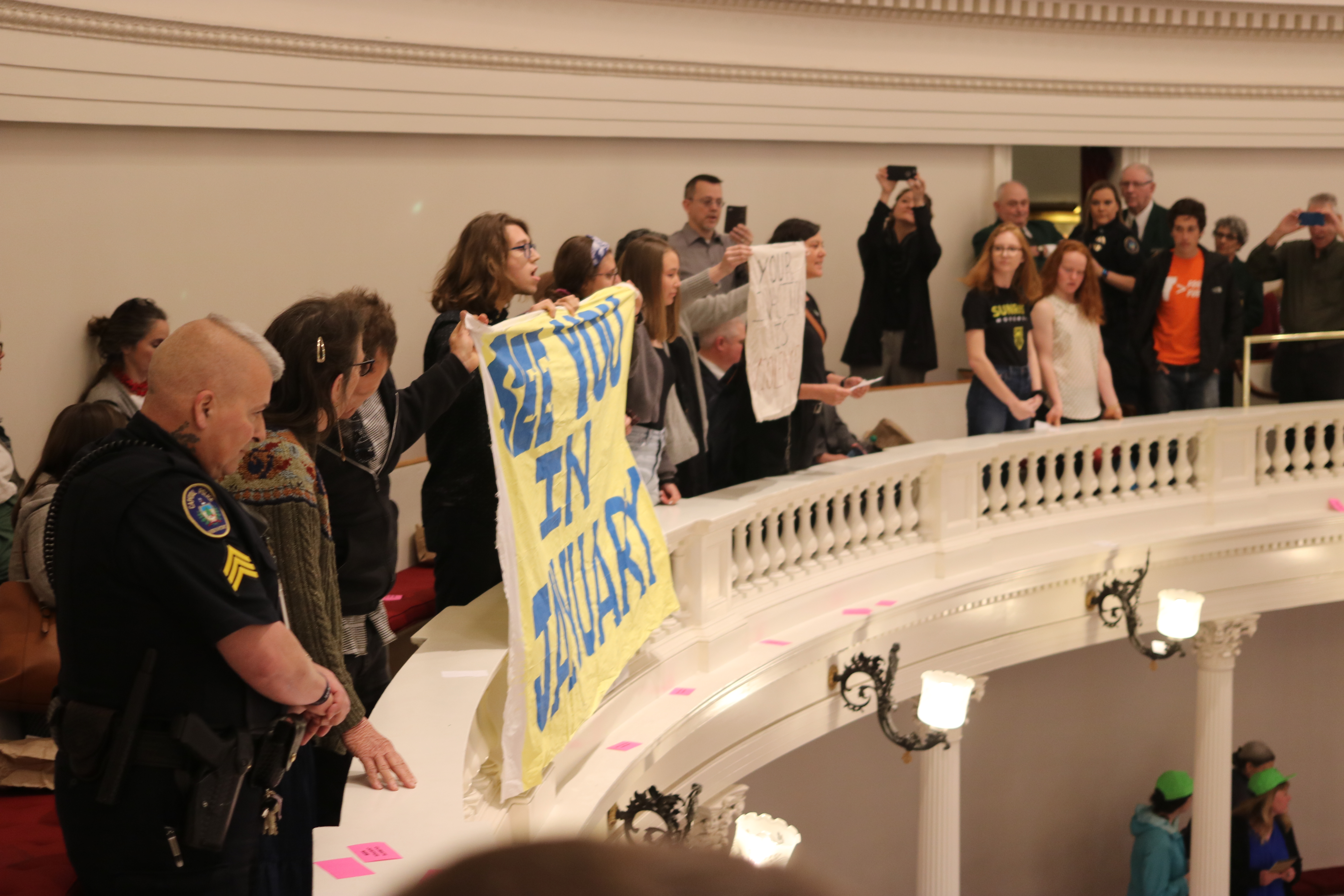 Climate protest halts House debate, three arrested - VTDigger